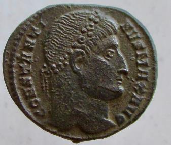 Constantine I. 307/310-337 AD. Æ Follis, Roma seated left on shield ...
