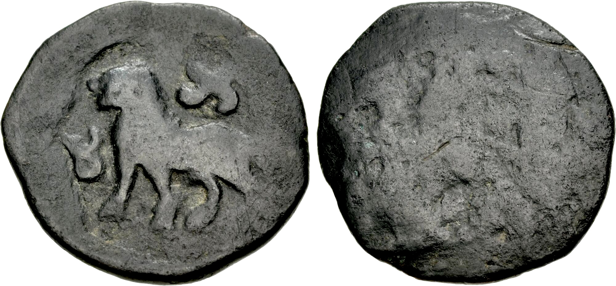 INDIA, TAXILA: Copper coin with lion, taurine and swastika. Very Rare.