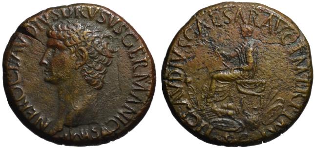 Nero Claudius Drusus AE sestertius - Claudius seated on weapons
