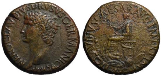 Nero Claudius Drusus AE sestertius - Claudius seated on weapons