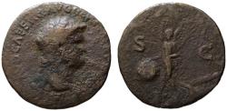 Nero Claudius Drusus AE sestertius - Claudius seated on weapons
