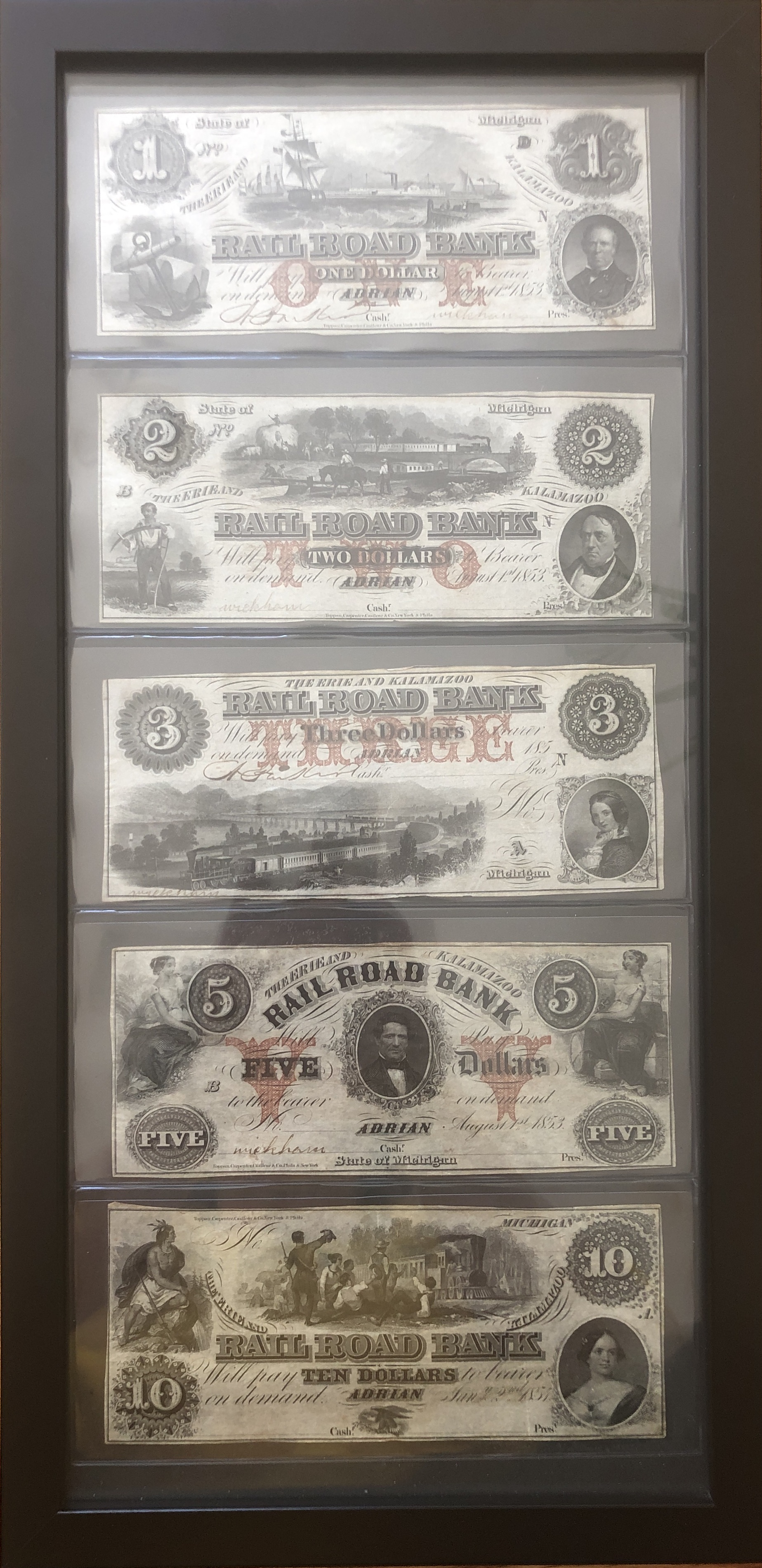 PAPER CURRENCY: Five Michigan Railroad Bank Notes, Framed In Protective ...
