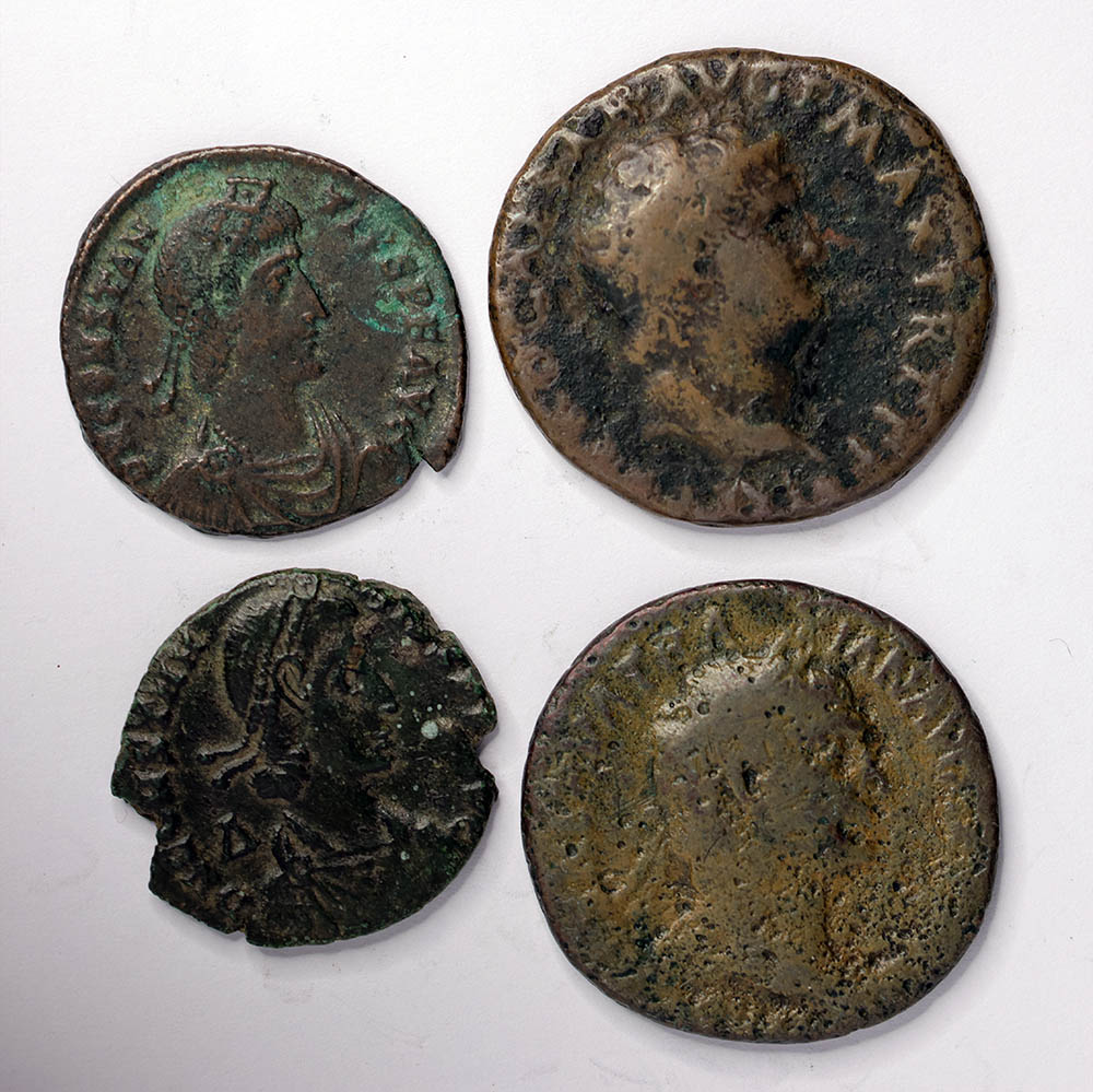 Roman Imperial lot of 4 bronze coins, incl. Nero, Domitian and ...