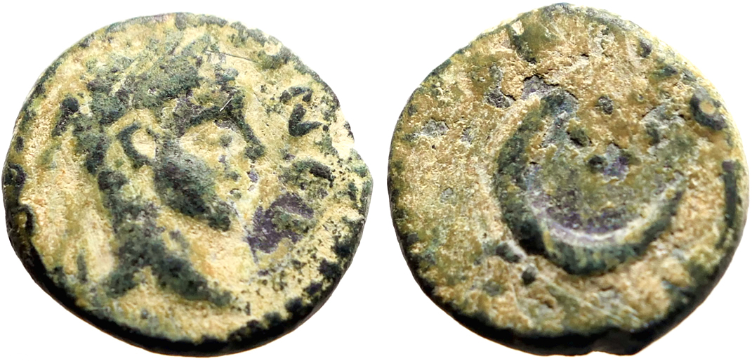 Caracalla AE14 Mesopotamia. Carrhae. Crescent w. 8 point star