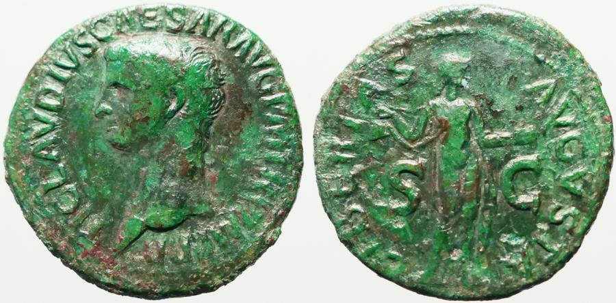 Claudius AE30 as. Libertas holds pileus | Roman Imperial Coins