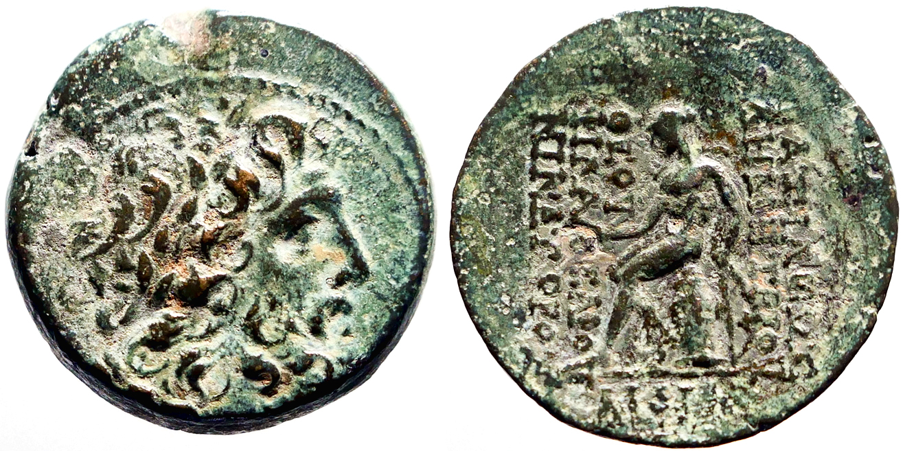 Seleukid Kings. Demetrios II AE24 Zeus / Apollo seated on omphalos
