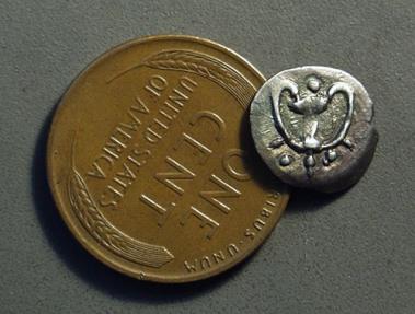 CALABRIA, Taras (Tarentum). AR Obol (0.39g), c. 325-280 BC. | Greek Coins