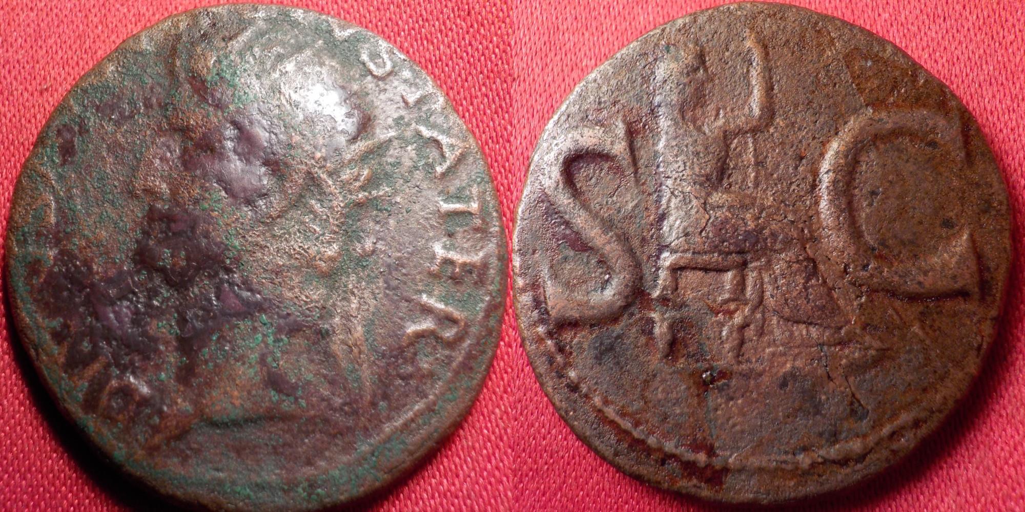 DIVUS AUGUSTUS AE as. Struck by Tiberius. Livia seated, flanked by large SC