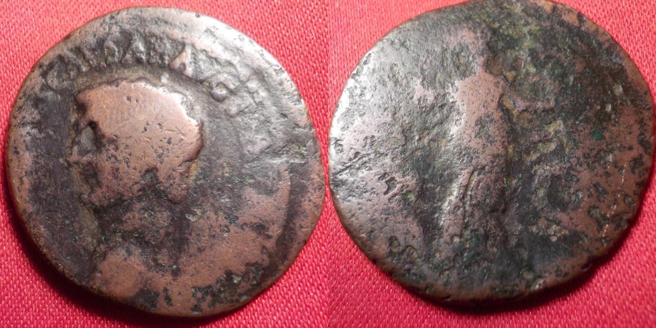 CLAUDIUS AE as. Minerva advancing right, holding spear & shield.