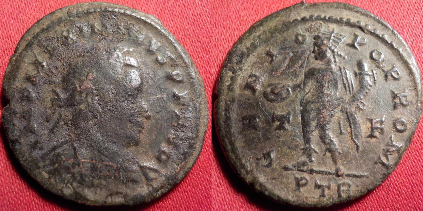 MAXIMINUS II AE follis. Struck at Trier, 310-313 AD. GENIO POP ROM.