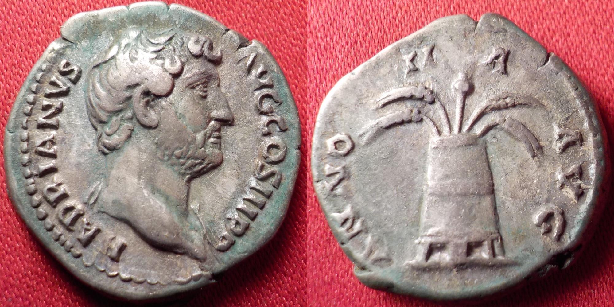 HADRIAN AR silver denarius. ANNONA AVG, modius with grain ears & poppy.