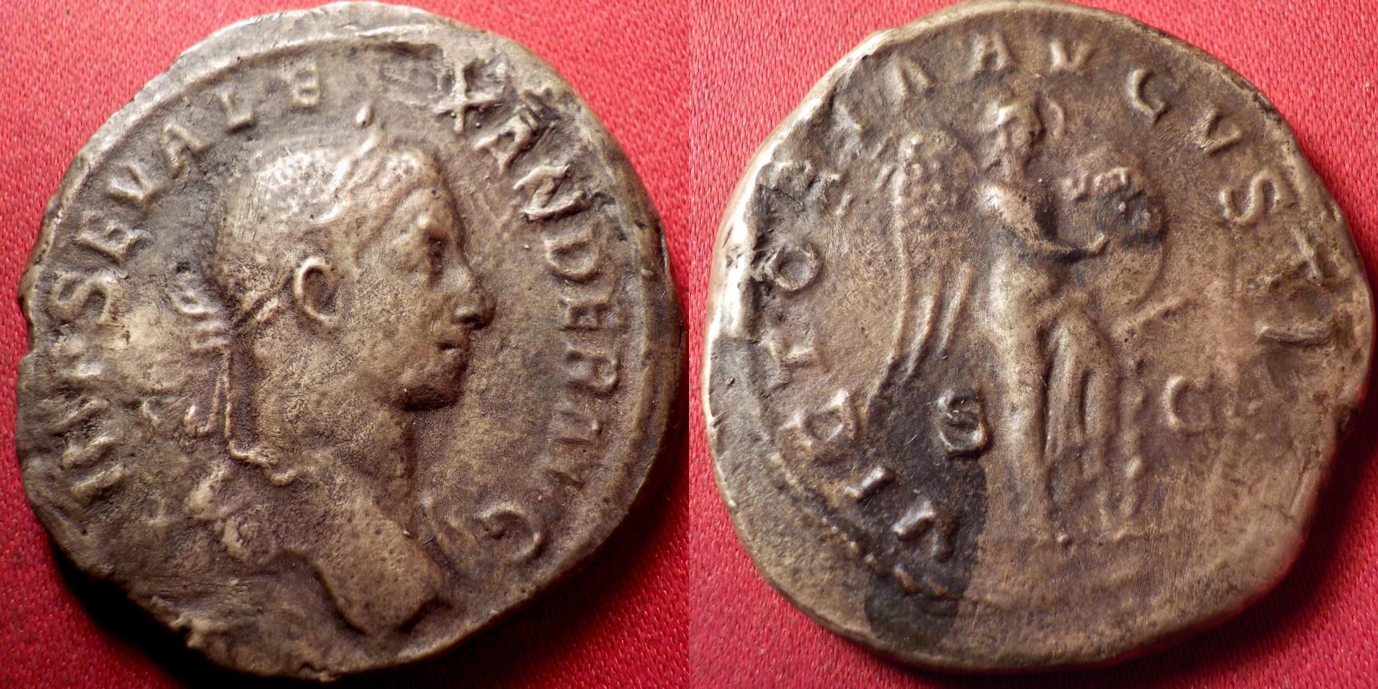 SEVERUS ALEXANDER AE sestertius. Victoria standing right, attaching ...
