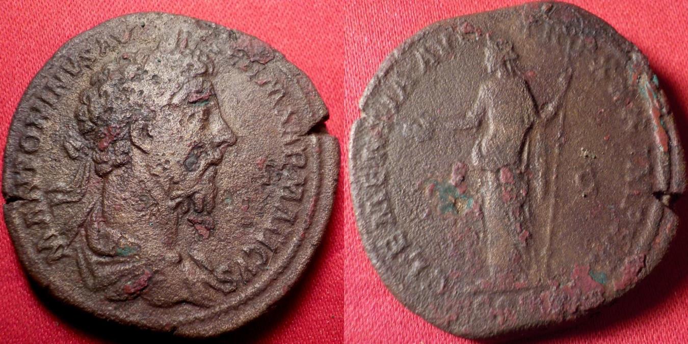 MARCUS AURELIUS AE sestertius. Clementia standing, holding patera & scepter. 175-176 AD.