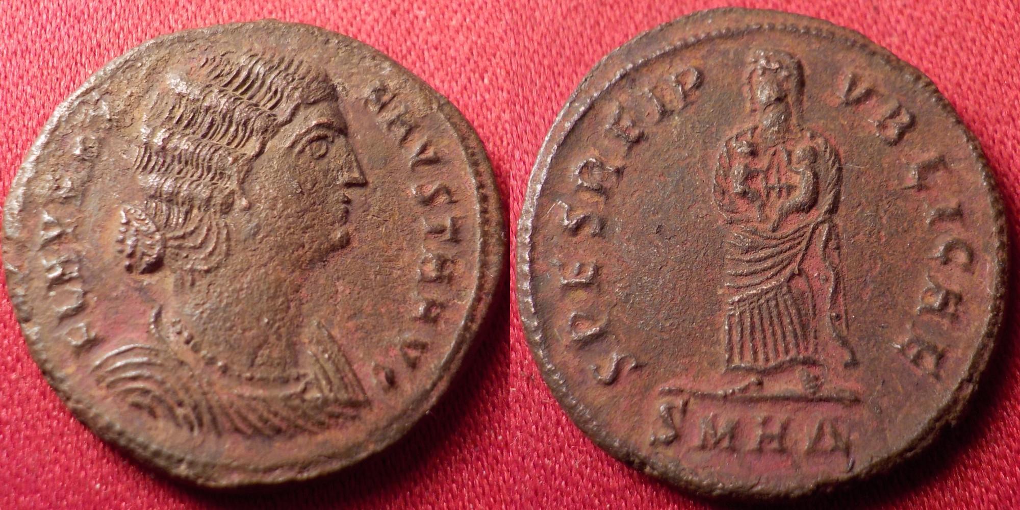 FAUSTA AUGUSTA AE follis. Heraclea mint. Spes standing, holding children.