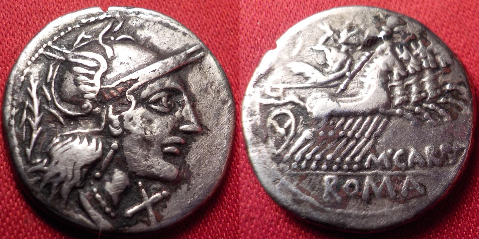 MARCUS PAPIRIUS CARBO AR silver denarius. Helmeted Roma, Jupiter in ...