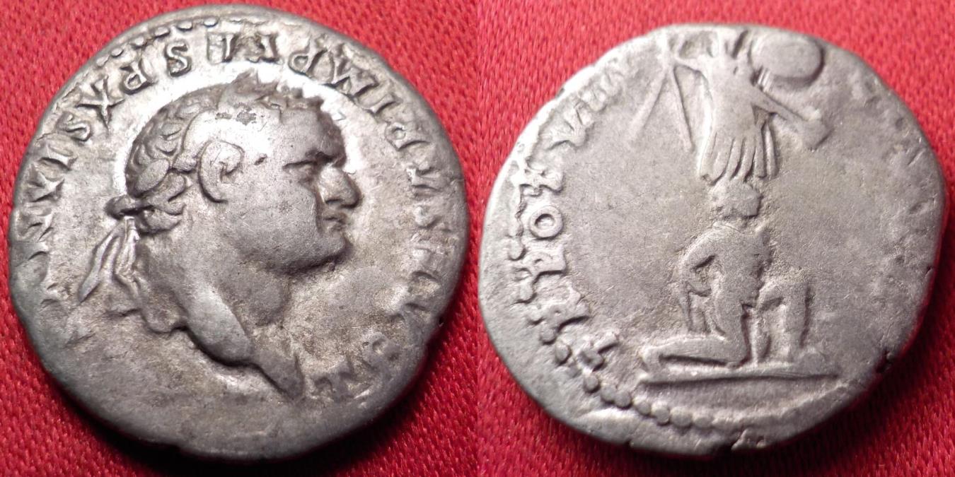 TITUS CAESAR AR silver denarius. Captive under trophy of arms. 79 AD ...