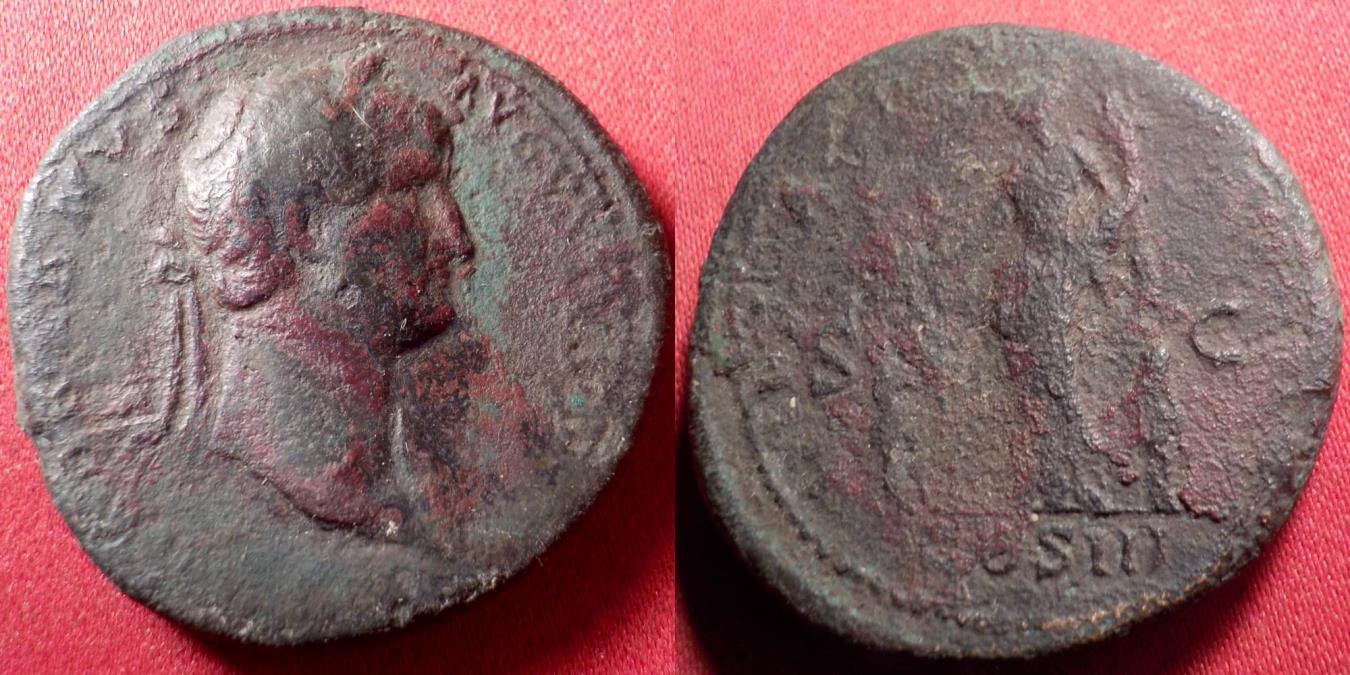 HADRIAN AE sestertius. HILARITAS P R, Hilaritas standing, holding palm ...