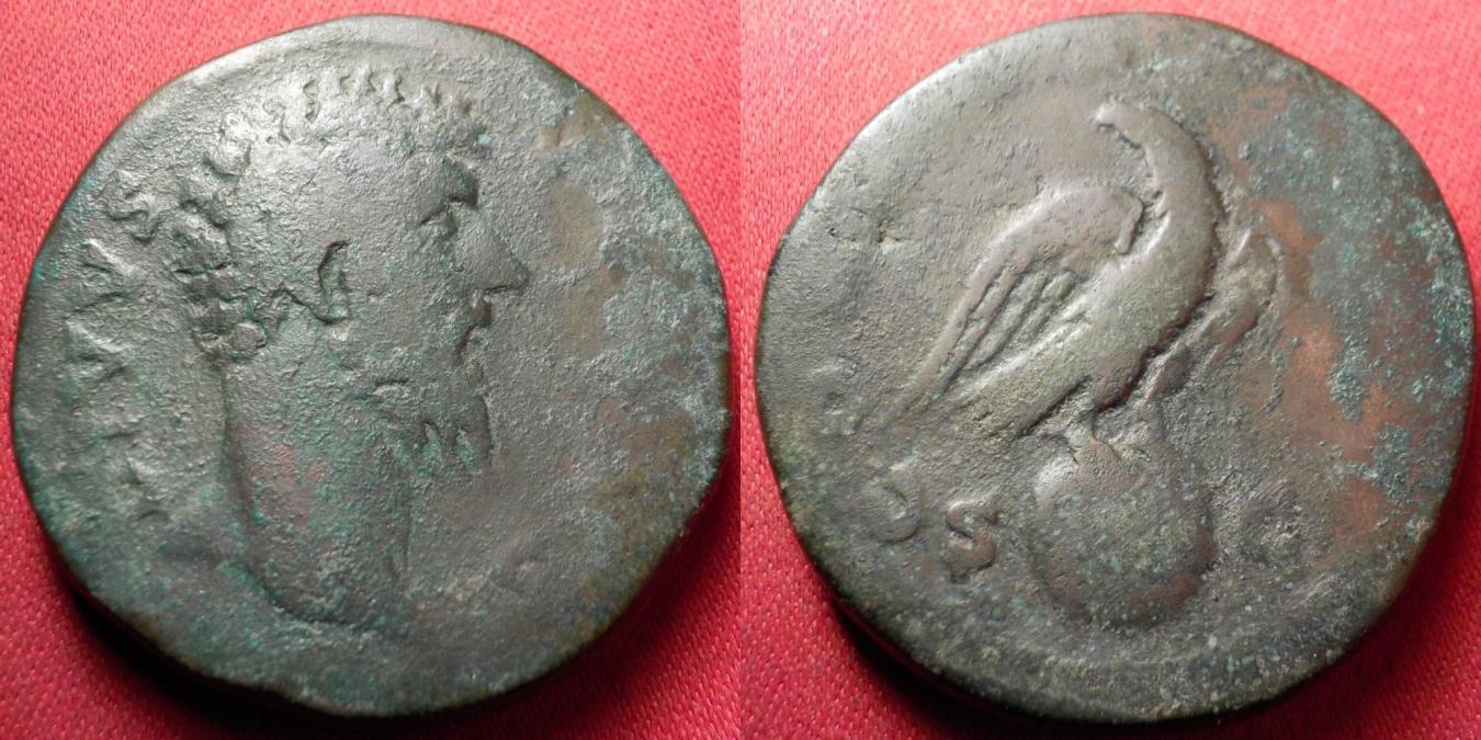 DIVUS LUCIUS VERUS AE sestertius. CONSECRATIO, eagle standing on globe.