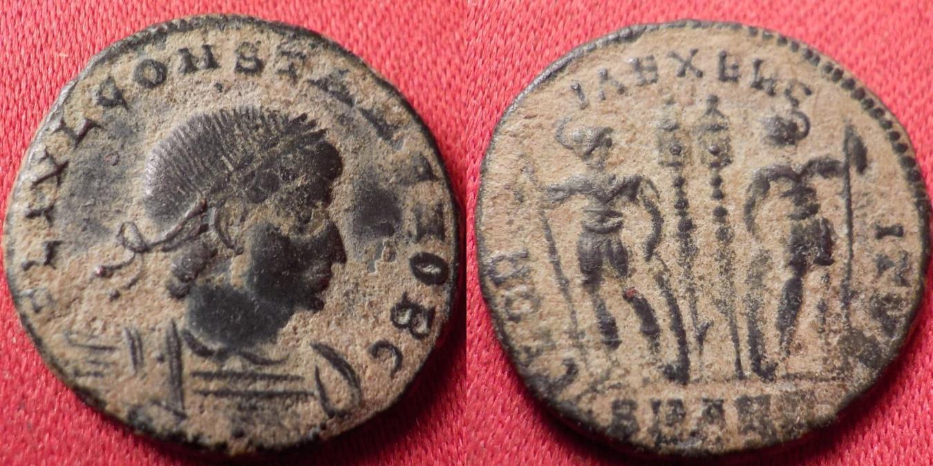 CONSTANS CAESAR AE follis. Antioch mint. Soldiers with two standards.